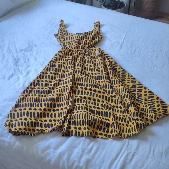 Nooworks | Dresses | Nooworks Yellow And Black Striped Garment | Poshmark
